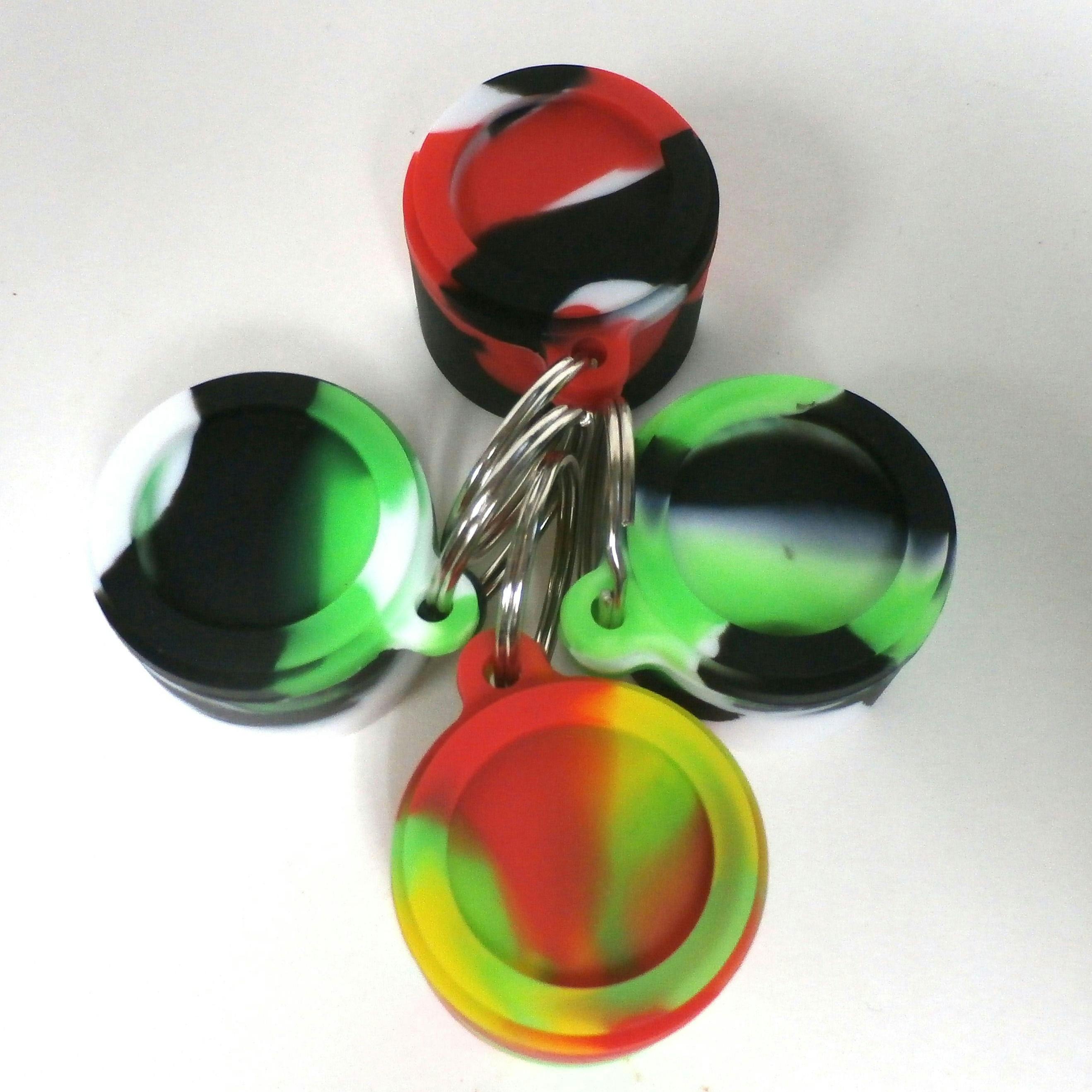 CRABS N CANNABIS: SET OF 4 TYE DYE SILICONE CONTAINERS W/ KEY RING | Leafly